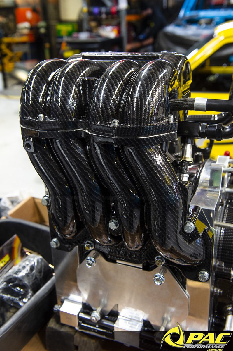 BILLET 13B GETS THE FULL CARBON FIBER TREATMENT. Pac Performance Racing